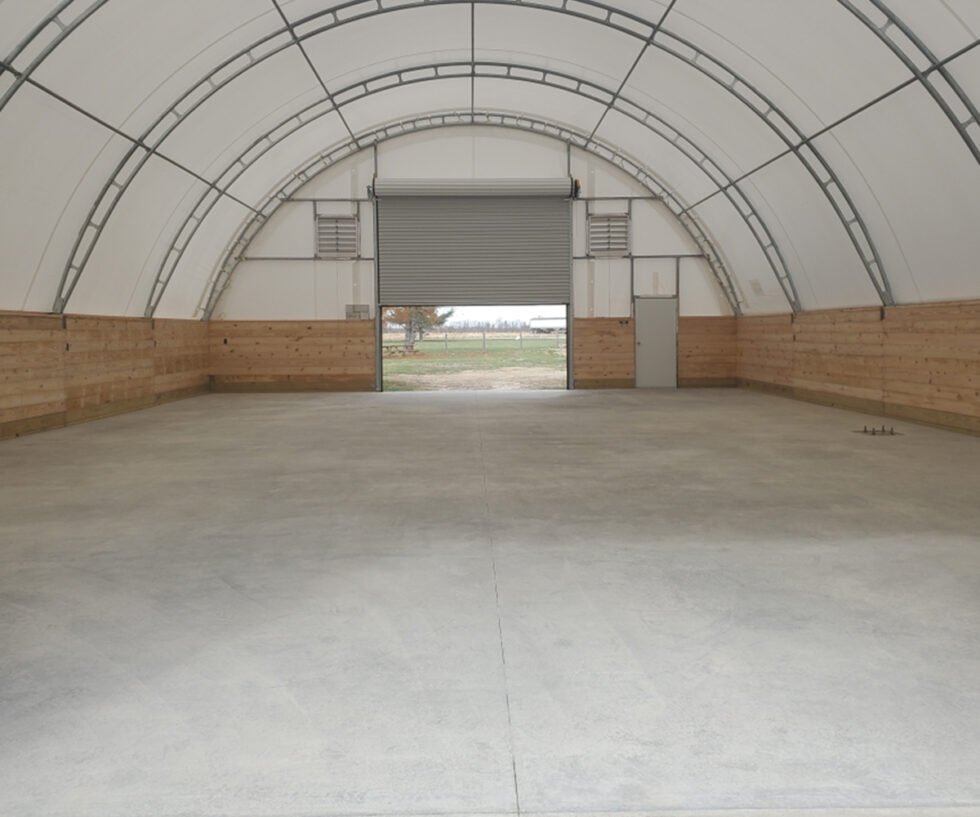 A hoop building frame is steel. Steel rusts with moisture and air, but ...